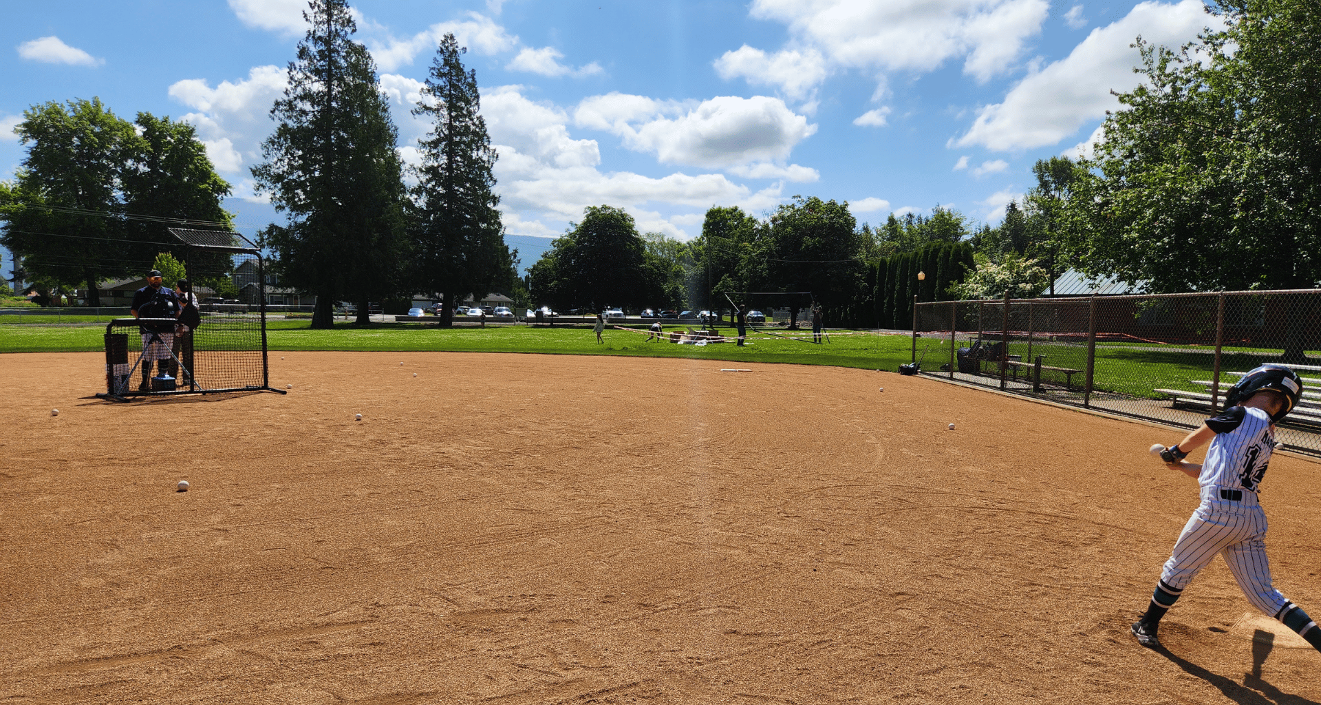 The Benefits of Hitting on a Pitching Machine vs. a Live Pitcher